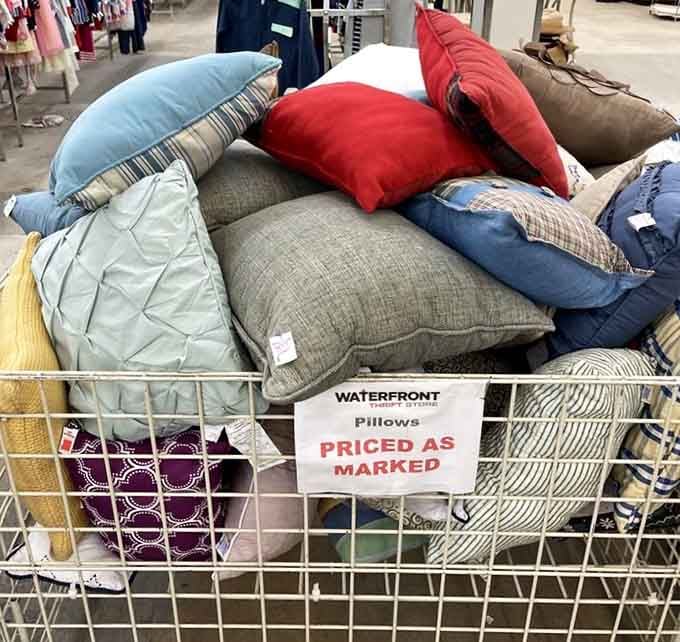 A rainbow of throw pillows waiting to make your couch infinitely more comfortable and colorful.