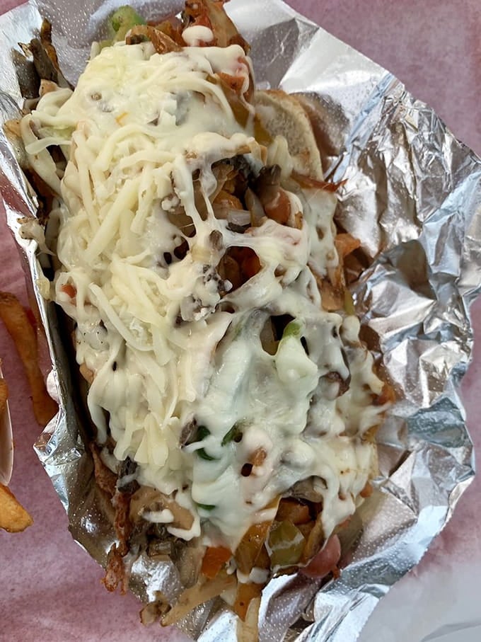 When your hot dog comes loaded with enough toppings to require architectural support, you're doing something right.