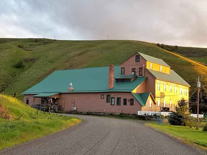 Historic mill buildings nestled in rolling hills, because wheat doesn't grow itself and someone's gotta process it.