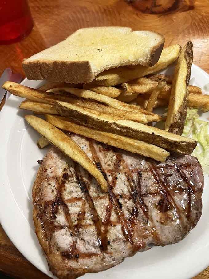When you're not in a burger mood (sacrilege!), the perfectly grilled pork chop steps up to the plate with no apologies.
