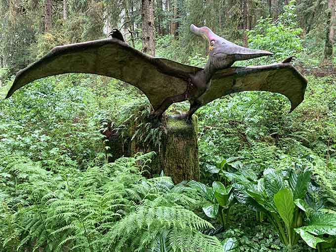 Proof that even concrete pteranodons need a good perch to contemplate life's mysteries from above.