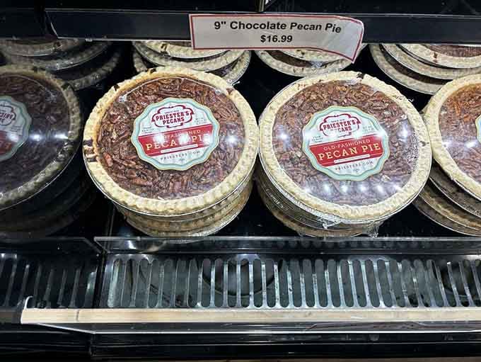 Chocolate pecan pies stacked like edible treasure, each one a masterpiece of Southern baking tradition.