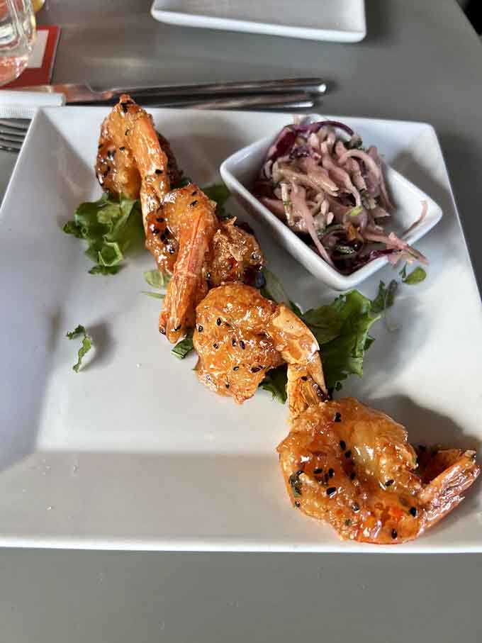 Bang bang shrimp arrives glistening and gorgeous, ready to make you forget every other appetizer you've ever ordered.