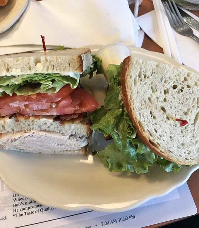 The Vernon club sandwich: layers of turkey, bacon, and lettuce stacked like edible architecture on rye.