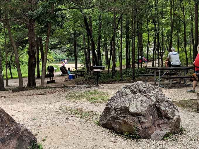 Shaded picnic tables overlook the creek where lunch tastes better with a soundtrack of rushing water.