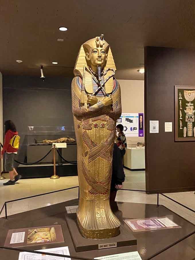 King Tut's replica coffin gleams with the kind of bling that makes modern jewelry look positively understated.