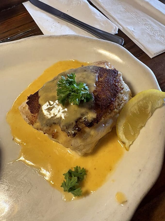 This golden-crusted grouper swimming in sauce proves that simple preparations can be absolutely spectacular when done right.