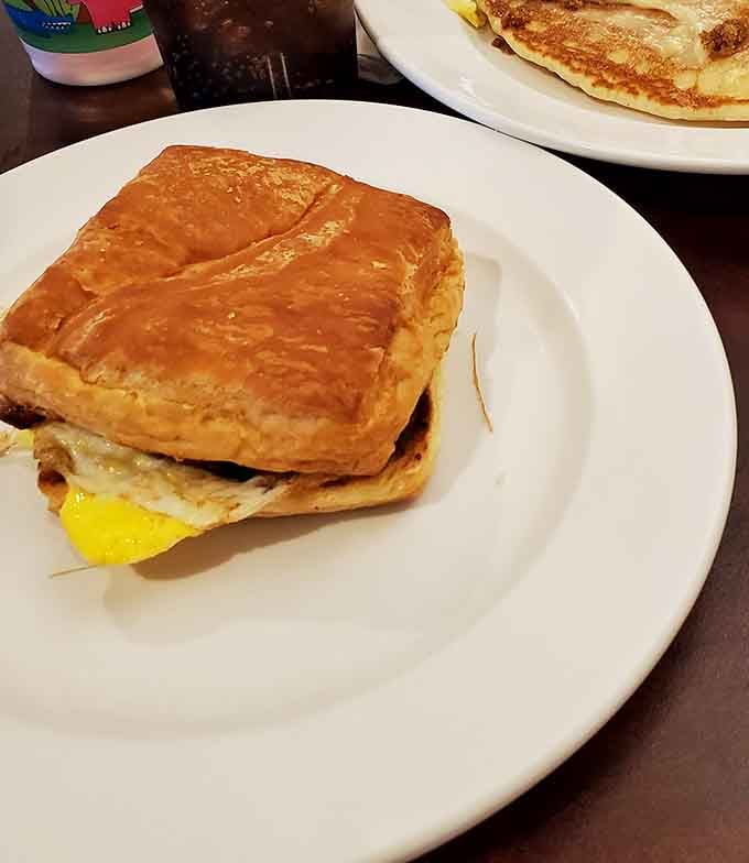 Breakfast sandwiches here aren't just meals, they're architectural achievements&mdash;layers of egg and cheese nestled between perfectly toasted bread.
