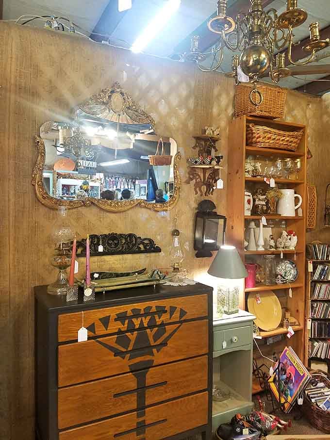 That ornate mirror and vintage dresser combo proves they really don't make things like this anymore, do they?