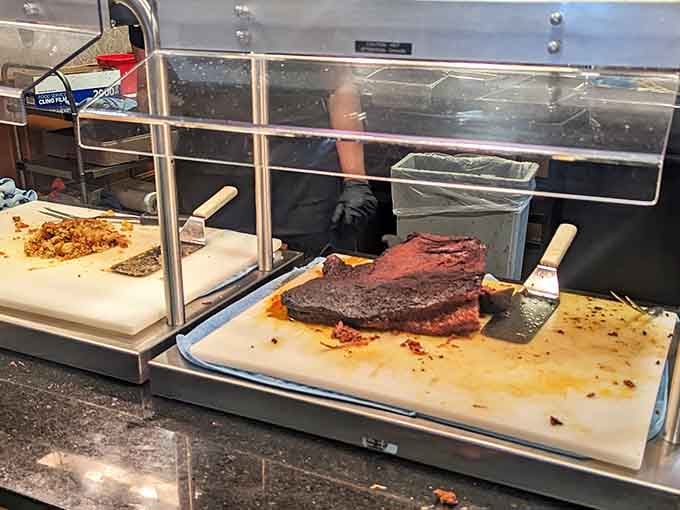 That beef brisket sits there like it's posing for its own cooking show, all tender and perfectly seasoned glory.