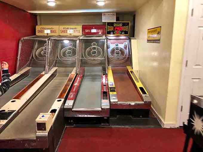Vintage skee-ball lanes ready to test your aim and transport you straight back to childhood summers.