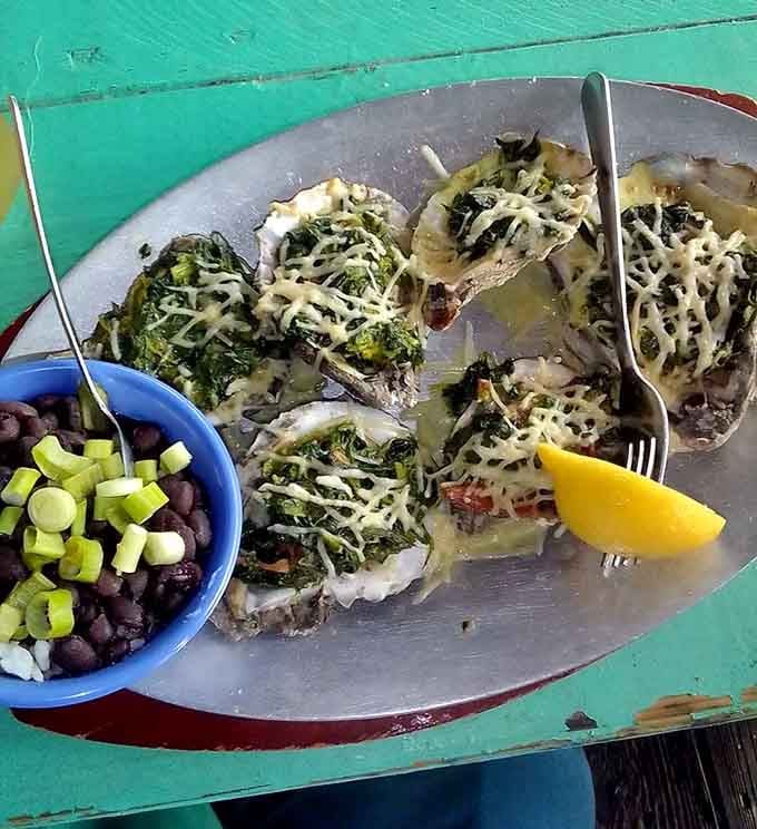Rockefeller oysters topped with spinach and cheese, because sometimes oysters need a little fancy dress-up.