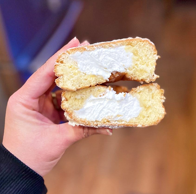 The angel cream filling inside this pillowy donut is basically what clouds would taste like if clouds were delicious.