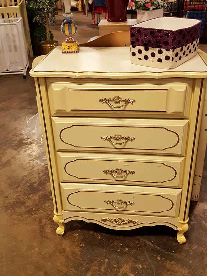 A vintage yellow dresser that's practically begging to be the star of your next room makeover.
