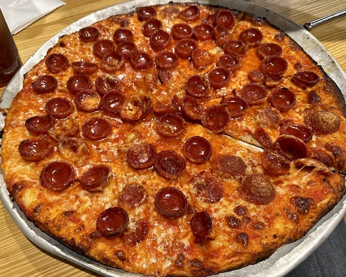 Double pepperoni means double happiness, with crispy edges that curl up like they're waving hello to your taste buds.