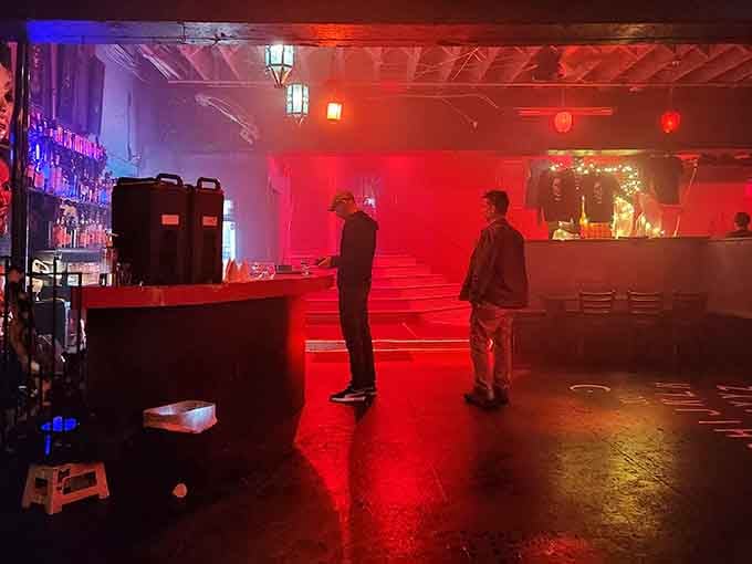 The spacious interior glows with ever-changing colors, making every visit feel like discovering a new dimension of darkness.