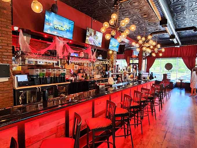 Even the bar area commits fully to the theme, proving day drinking can be delightfully spooky too.
