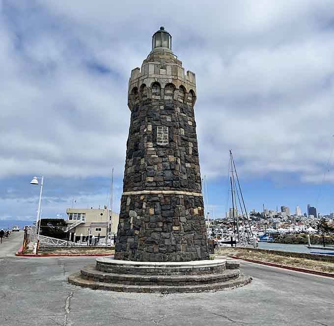 The historic lighthouse stands guard over the marina, a striking landmark visible from the Wave Organ's perch.