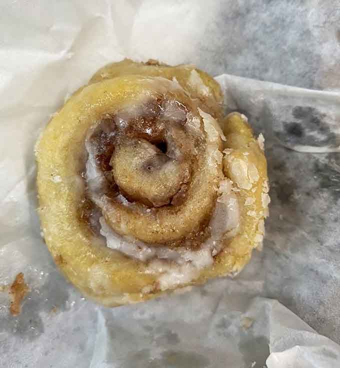 That cinnamon roll swirl looks like it's hypnotizing you into ordering one, and honestly, you should probably just surrender now.