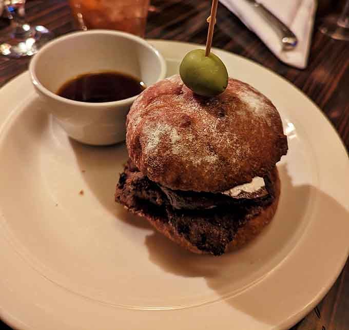 When your steak sandwich requires structural engineering to eat, you know someone in the kitchen understands portion control differently.