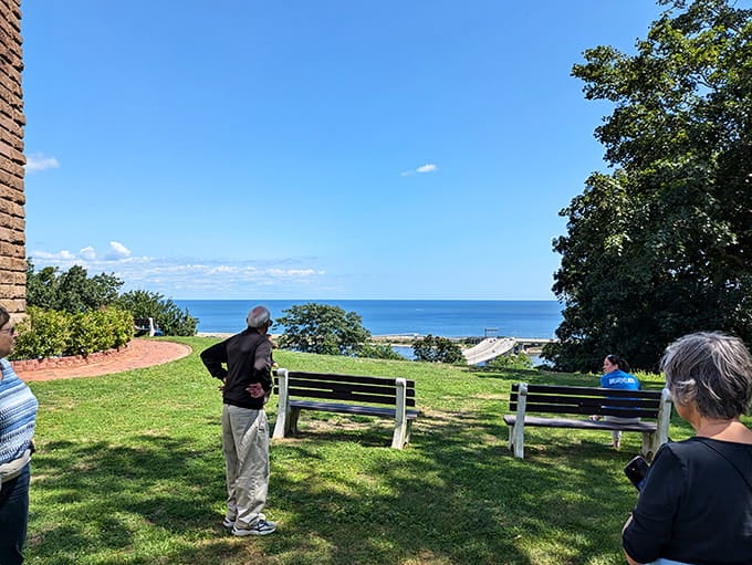 Visitors soaking in million-dollar views that cost exactly zero dollars to enjoy from these historic grounds.