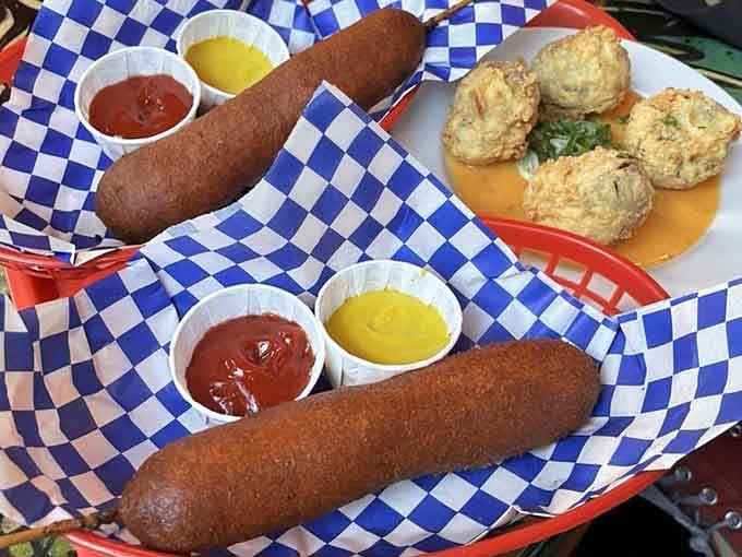 Behold the foot-long glory alongside its mini companions, proving size matters when corn dogs are involved.