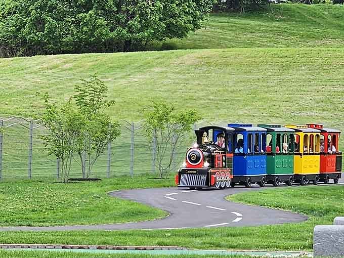 A trackless train chugging through the park because walking is apparently so last century for today's kids.
