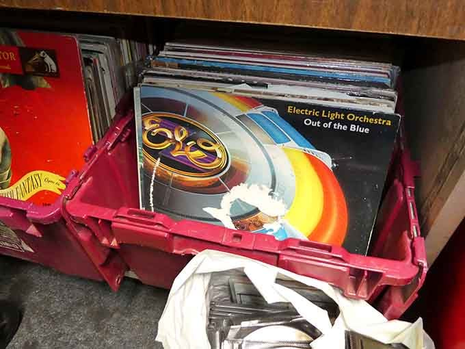 Vinyl treasures nestled in plastic crates &ndash; ELO's "Out of the Blue" on top. Music archaeology at its most rewarding.