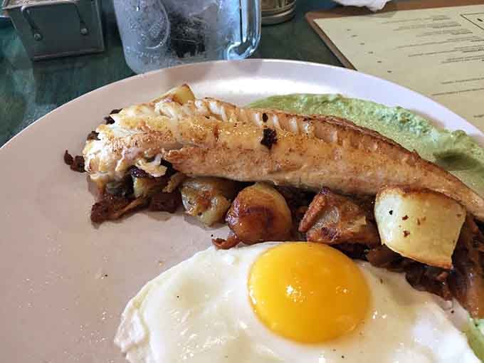 This isn't just breakfast; it's a morning symphony where every ingredient plays its part perfectly, crowned with that golden-yolked masterpiece.