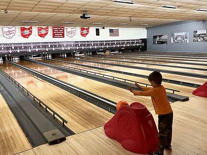 Gleaming lanes stretch endlessly under soft lights, where strikes still matter and keeping score means something real.