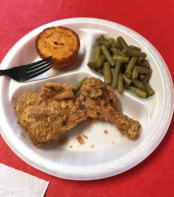 Perfectly crispy fried chicken with green beans and cornbread that understands the assignment completely.