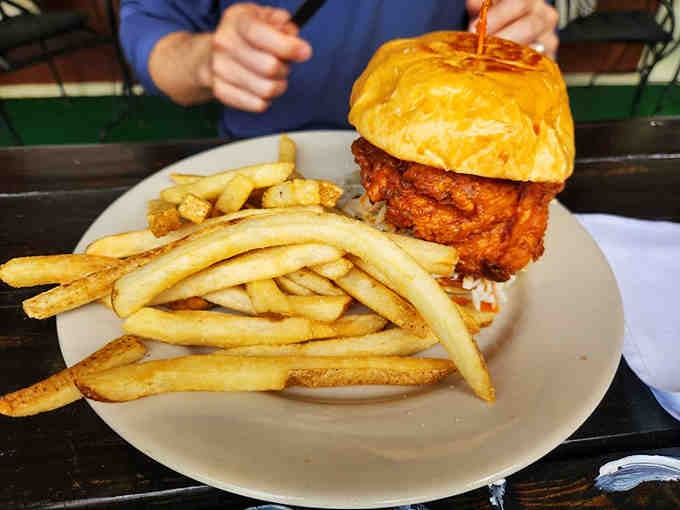 That golden puff pastry crown sitting atop spicy fried chicken is pure comfort food royalty at its finest.