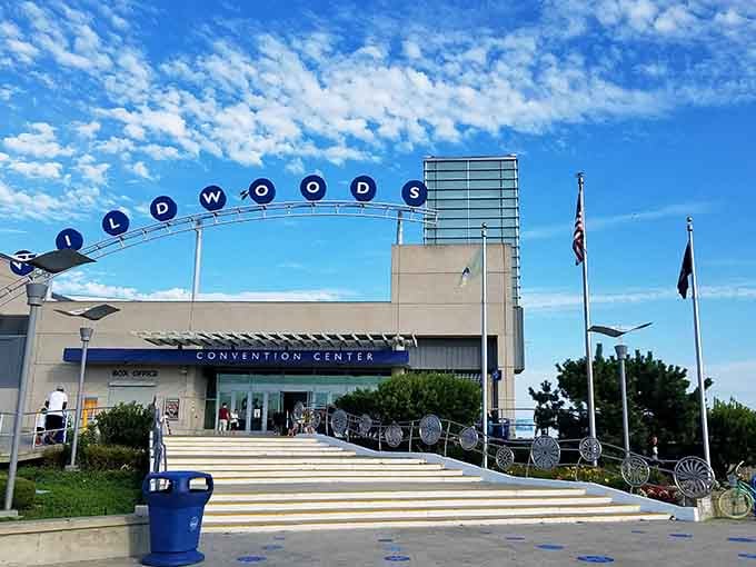 The Convention Center's retro sign arches overhead like a portal to a simpler, more neon-filled dimension.