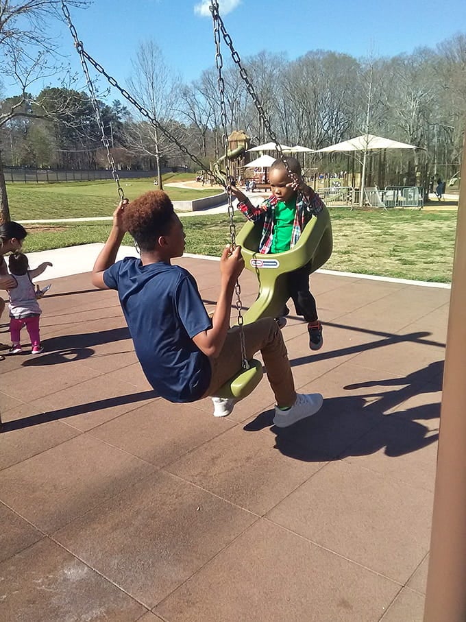 Those bucket swings prove that sometimes the simplest pleasures create the biggest smiles and longest memories.