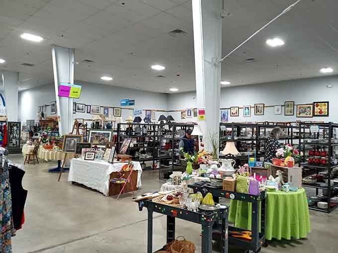 Tables draped in colorful cloths showcase home decor like it's an art gallery, because someone's trash really is another's treasure.