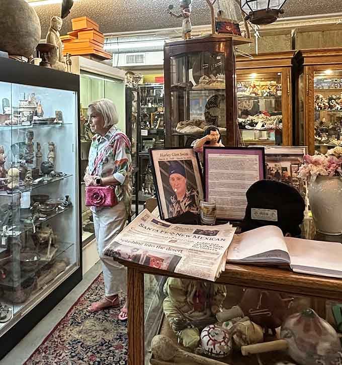 Window shopping takes on new meaning when every glance reveals another potential heirloom. The thrill of discovery is written on this browser's face.