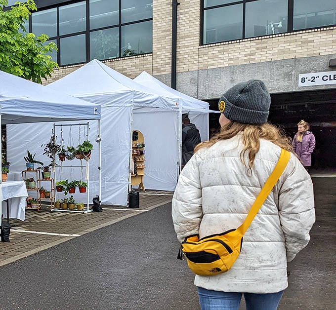 A shopper contemplates her next move in this tactical game of treasure hunting, where patience often leads to the most remarkable finds.
