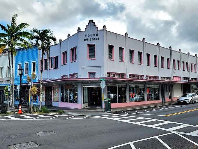 The Young Building stands as a testament to Hilo's architectural heritage, its stepped roofline a distinctive silhouette against the clouds.