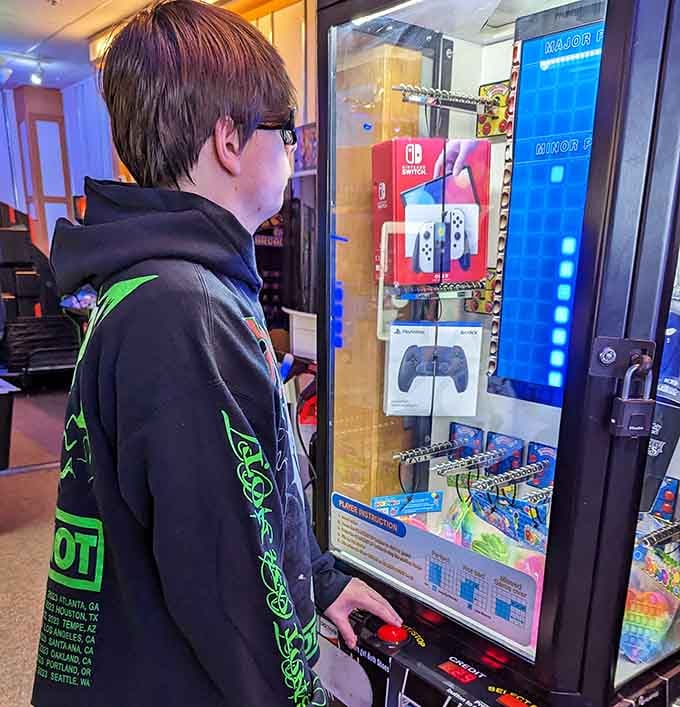 When the claw machine calls your name, resistance is futile, especially with a Nintendo Switch dangling as bait.