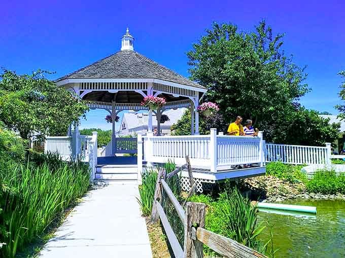 The charming gazebo offers a peaceful spot to contemplate your purchases and plan your next shopping strike.