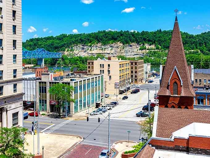The blue bridge peeks between buildings, connecting communities while your budget stays firmly grounded in reality.