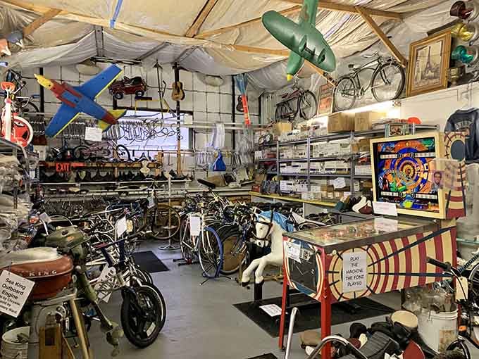 Every inch of ceiling space holds another treasure—bicycles, toys, and memories suspended like a time capsule overhead.