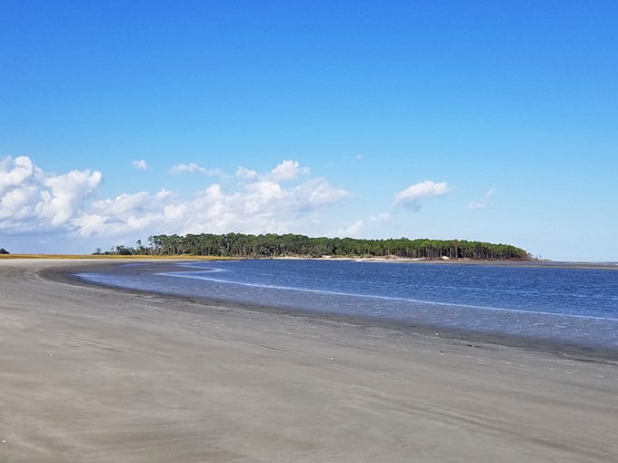 Miles of untouched sand meet calm blue waters in this secluded paradise that time forgot.