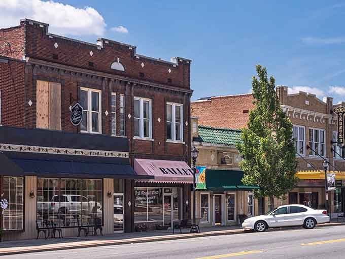Brick storefronts with decorative details line the street, each one a testament to when craftsmanship actually meant something special.