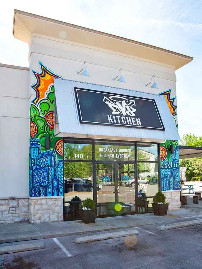 Those vibrant murals flanking the entrance announce that breakfast here is anything but boring or predictable, friends.