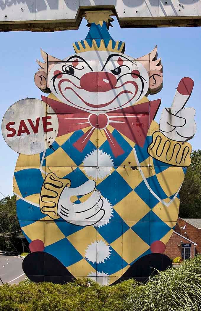 The infamous "Evil Clown of Middletown" grins mischievously, a roadside sentinel that's been giving kids nightmares for generations.