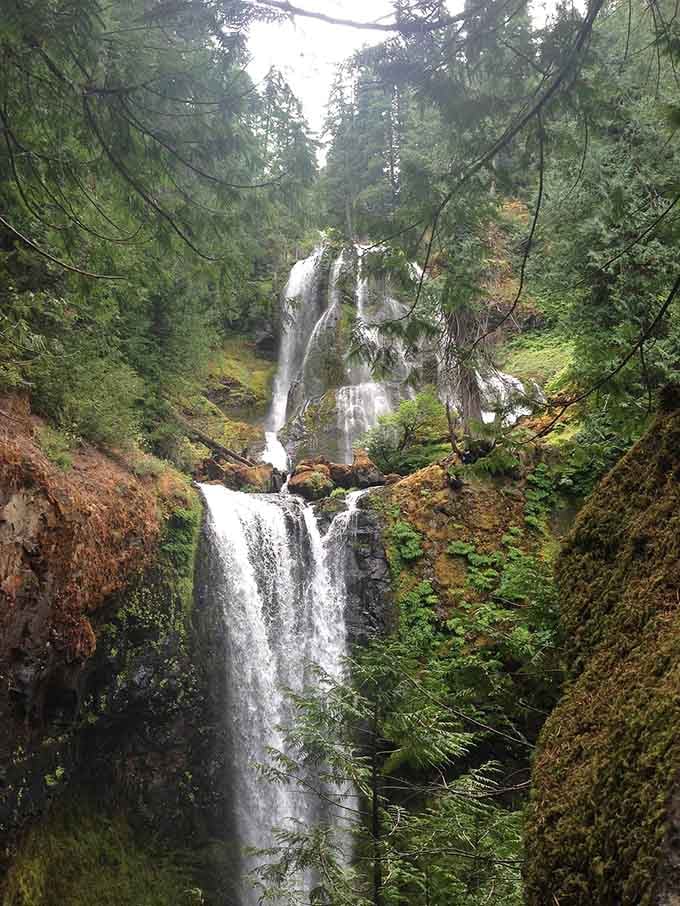 A double-decker waterfall spectacular where nature decided one level simply wasn't enough to show off its architectural skills properly.
