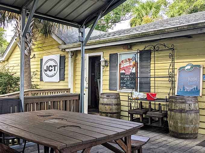 This yellow cottage with its covered porch looks like someone's beach house decided to start serving the best seafood around.