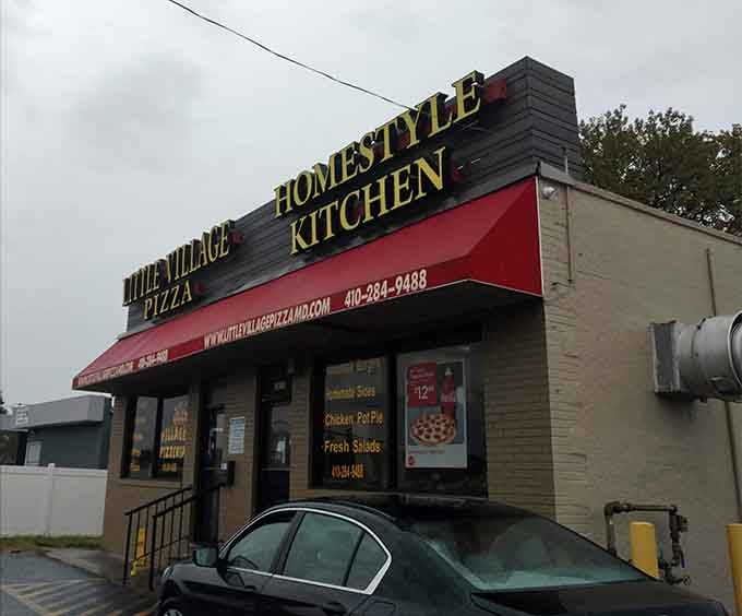 Little Village Pizza's no-nonsense exterior focuses on what matters: homestyle pizza that keeps Dundalk coming back. Function over flash!