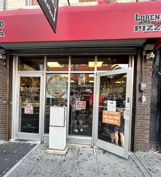 Behind these humble doors lies pizza so legendary, Philadelphians willingly line up just to fold those massive slices.